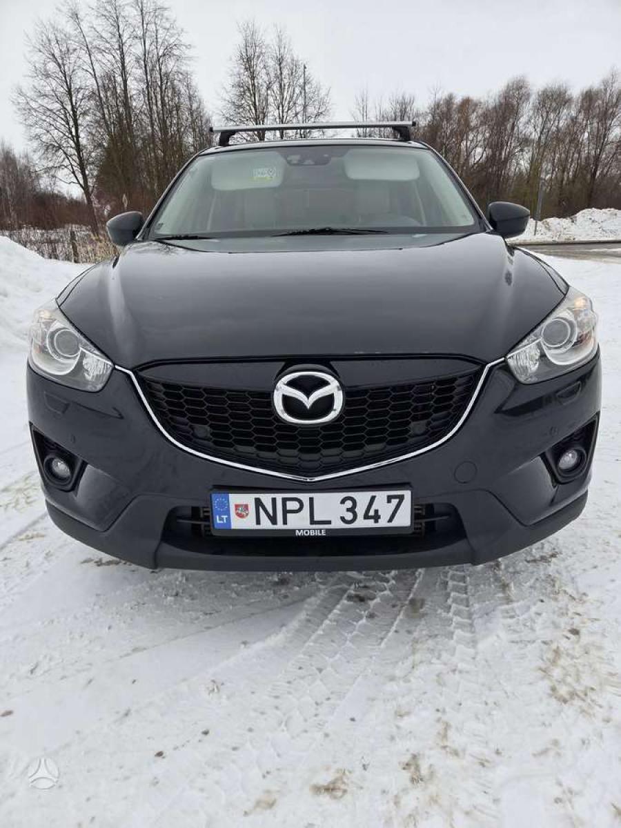 Black Mazda CX-5 2014 in Birzai, with an engine capacity of 2.19 L and mileage of 229 thousand km for 8150 €, photo 3 on AUTOMOTO.COM.LV