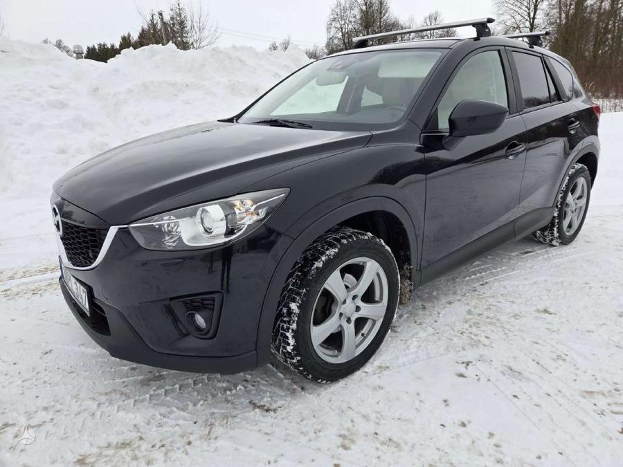 Black Mazda CX-5 2014 in Birzai, with an engine capacity of 2.19 L and mileage of 229 thousand km for 8150 €, photo 4 on AUTOMOTO.COM.LV