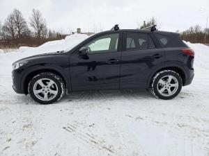 Black Mazda CX-5 2014 in Birzai, with an engine capacity of 2.19 L and mileage of 229 thousand km for 8150 €, photo 5 on AUTOMOTO.COM.LV
