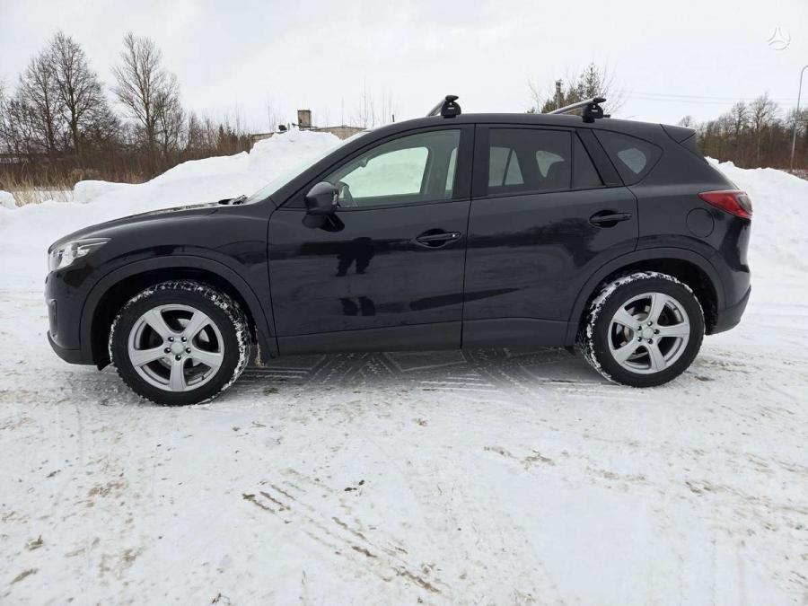 Black Mazda CX-5 2014 in Birzai, with an engine capacity of 2.19 L and mileage of 229 thousand km for 8150 €, photo 5 on AUTOMOTO.COM.LV