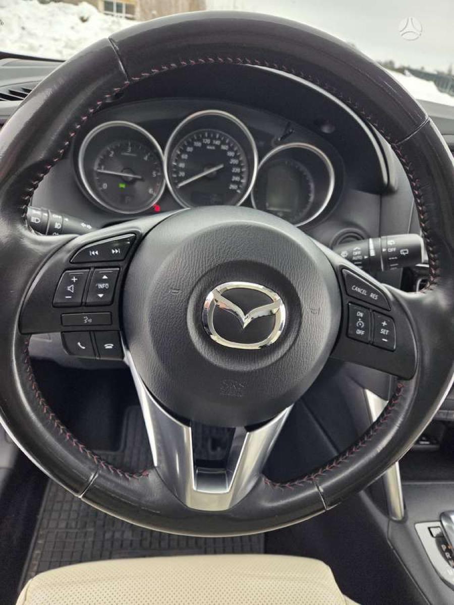 Black Mazda CX-5 2014 in Birzai, with an engine capacity of 2.19 L and mileage of 229 thousand km for 8150 €, photo 20 on AUTOMOTO.COM.LV