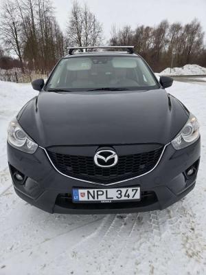 Black Mazda CX-5 2014 in Birzai, with an engine capacity of 2.19 L and mileage of 229 thousand km for 8150 €, photo 27 on AUTOMOTO.COM.LV