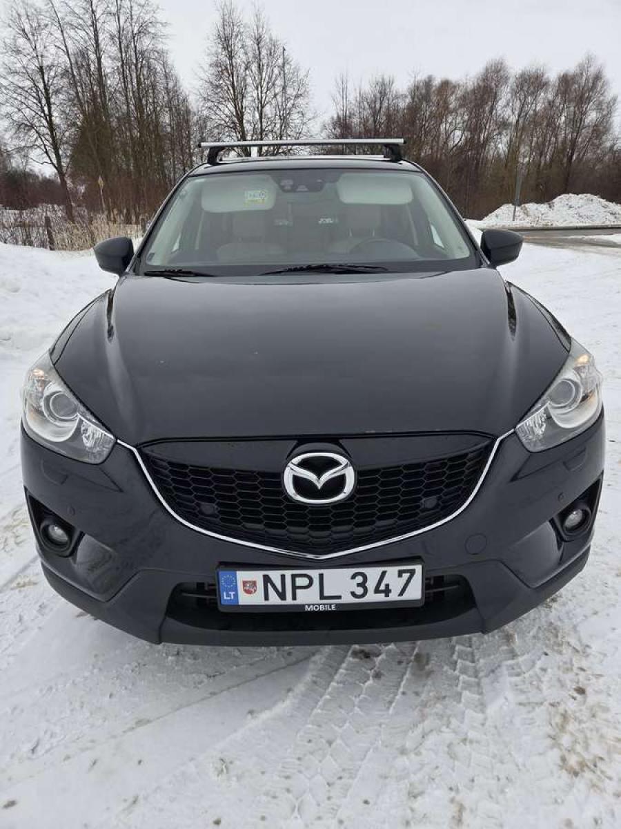 Black Mazda CX-5 2014 in Birzai, with an engine capacity of 2.19 L and mileage of 229 thousand km for 8150 €, photo 27 on AUTOMOTO.COM.LV