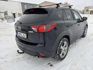 Black Mazda CX-5 2014 in Birzai, with an engine capacity of 2.19 L and mileage of 229 thousand km for 8150 €, photo 28 on AUTOMOTO.COM.LV