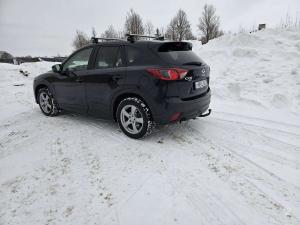 Black Mazda CX-5 2014 in Birzai, with an engine capacity of 2.19 L and mileage of 229 thousand km for 8150 €, photo 29 on AUTOMOTO.COM.LV