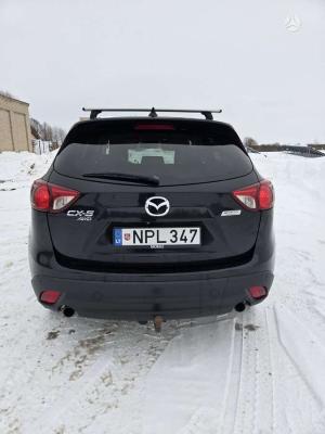 Black Mazda CX-5 2014 in Birzai, with an engine capacity of 2.19 L and mileage of 229 thousand km for 8150 €, photo 30 on AUTOMOTO.COM.LV