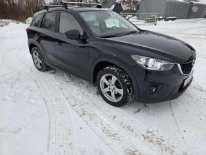 Black Mazda CX-5 2014 in Birzai, with an engine capacity of 2.19 L and mileage of 229 thousand km for 8150 €, photo 33 on AUTOMOTO.COM.LV