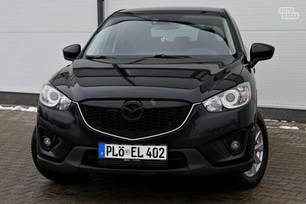 Black Mazda CX-5 2014 in Kretinga, with an engine capacity of 2.20 L and mileage of 208 thousand km for 6999 €, photo 2 on AUTOMOTO.COM.LV