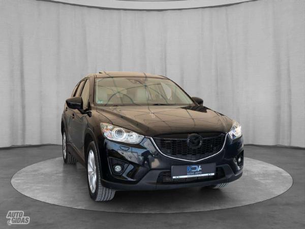Black Mazda CX-5 2014 in Marijampole, with an engine capacity of 2.20 L and mileage of 251 thousand km for 8450 €, photo 2 on AUTOMOTO.COM.LV