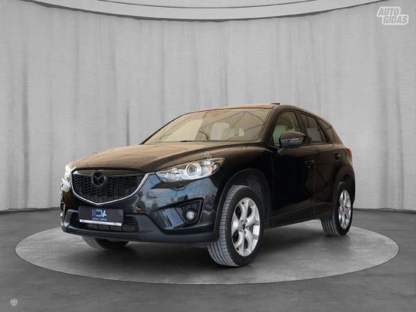 Black Mazda CX-5 2014 in Marijampole, with an engine capacity of 2.20 L and mileage of 251 thousand km for 8450 €, photo 5 on AUTOMOTO.COM.LV