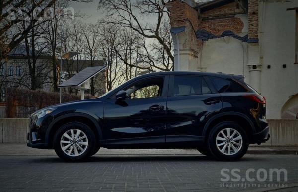 Black Mazda CX-5 2014 in Jelgava, with an engine capacity of 2.20 L and mileage of 266 thousand km for 7790 €, photo 4 on AUTOMOTO.COM.LV