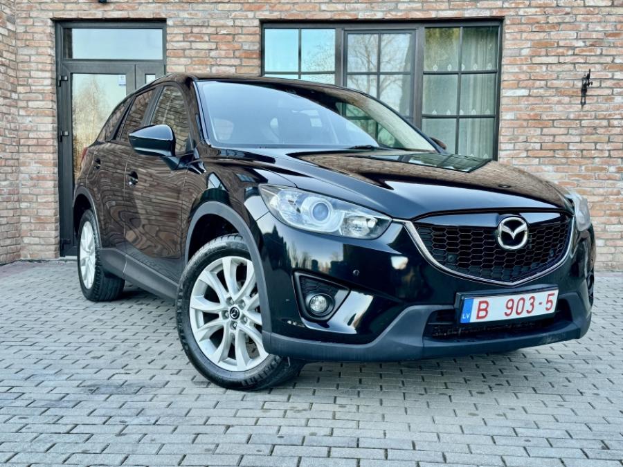 Black Mazda CX-5 2014 in Riga, with an engine capacity of 2.20 L and mileage of 175 thousand km for 9500 €, photo 4 on AUTOMOTO.COM.LV