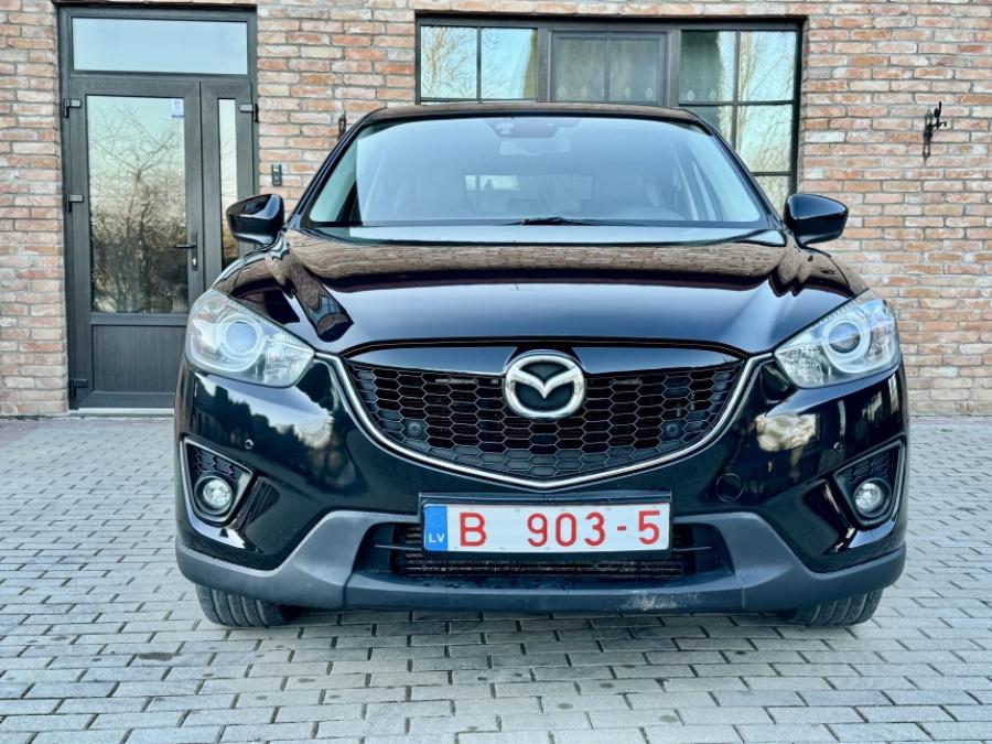 Black Mazda CX-5 2014 in Riga, with an engine capacity of 2.20 L and mileage of 175 thousand km for 9500 €, photo 5 on AUTOMOTO.COM.LV