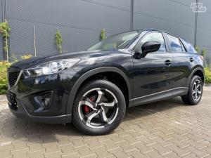 Black Mazda CX-5 2014 in Vilnius, with an engine capacity of 2.20 L and mileage of 310 thousand km for 6666 €, photo 3 on AUTOMOTO.COM.LV