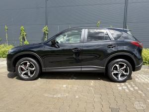 Black Mazda CX-5 2014 in Vilnius, with an engine capacity of 2.20 L and mileage of 310 thousand km for 6666 €, photo 4 on AUTOMOTO.COM.LV