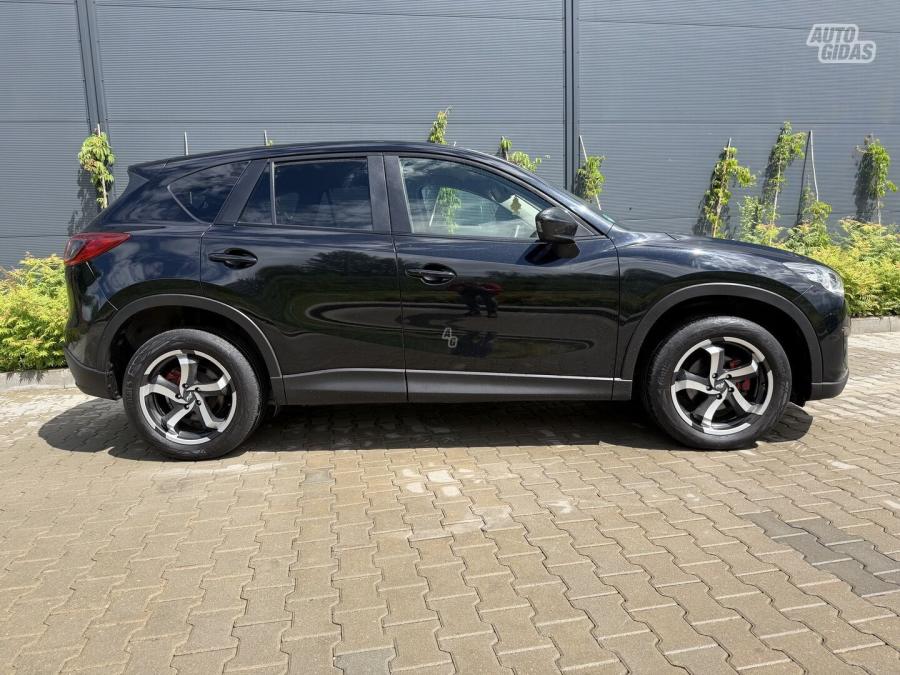 Black Mazda CX-5 2014 in Vilnius, with an engine capacity of 2.20 L and mileage of 310 thousand km for 6666 €, photo 8 on AUTOMOTO.COM.LV