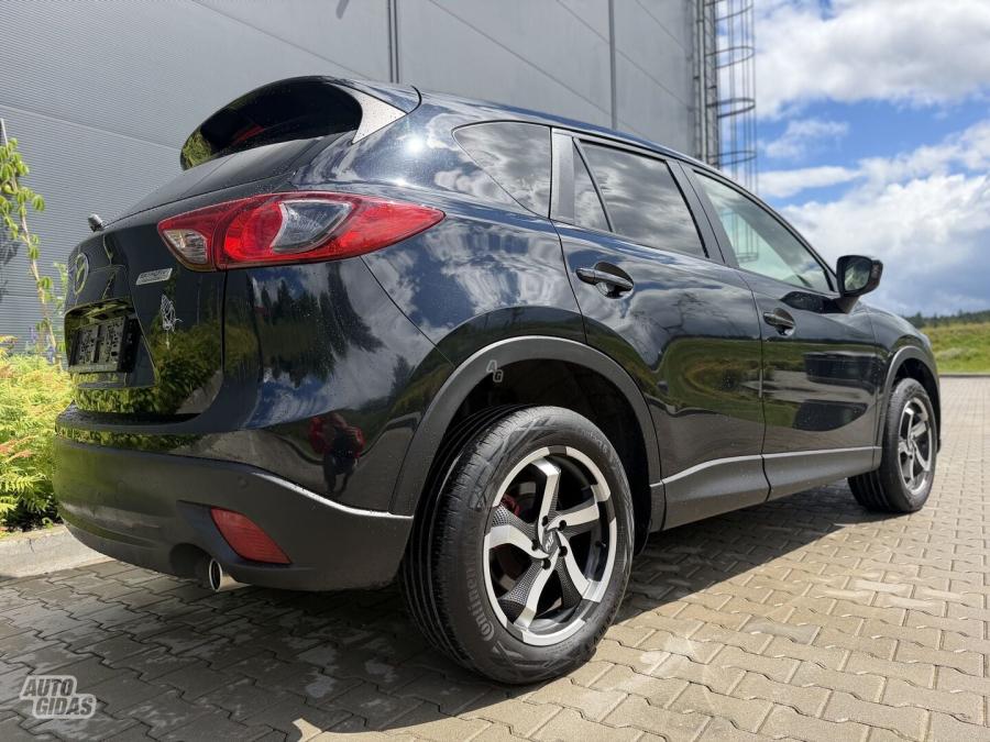 Black Mazda CX-5 2014 in Vilnius, with an engine capacity of 2.20 L and mileage of 310 thousand km for 6666 €, photo 9 on AUTOMOTO.COM.LV