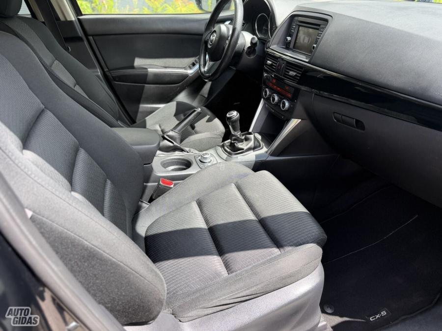 Black Mazda CX-5 2014 in Vilnius, with an engine capacity of 2.20 L and mileage of 310 thousand km for 6666 €, photo 10 on AUTOMOTO.COM.LV