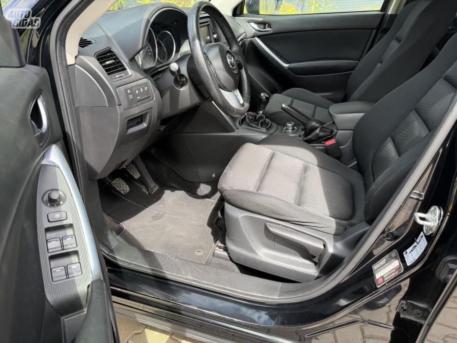 Black Mazda CX-5 2014 in Vilnius, with an engine capacity of 2.20 L and mileage of 310 thousand km for 6666 €, photo 13 on AUTOMOTO.COM.LV