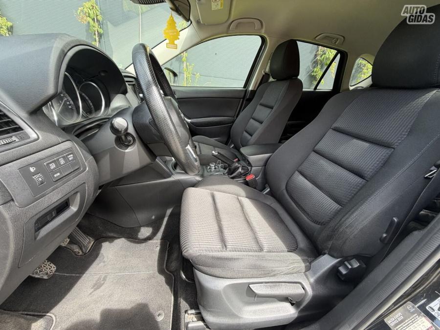 Black Mazda CX-5 2014 in Vilnius, with an engine capacity of 2.20 L and mileage of 310 thousand km for 6666 €, photo 14 on AUTOMOTO.COM.LV