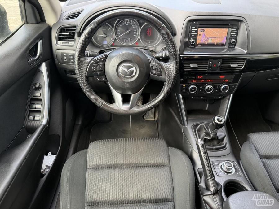 Black Mazda CX-5 2014 in Vilnius, with an engine capacity of 2.20 L and mileage of 310 thousand km for 6666 €, photo 16 on AUTOMOTO.COM.LV