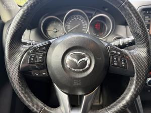 Black Mazda CX-5 2014 in Vilnius, with an engine capacity of 2.20 L and mileage of 310 thousand km for 6666 €, photo 17 on AUTOMOTO.COM.LV