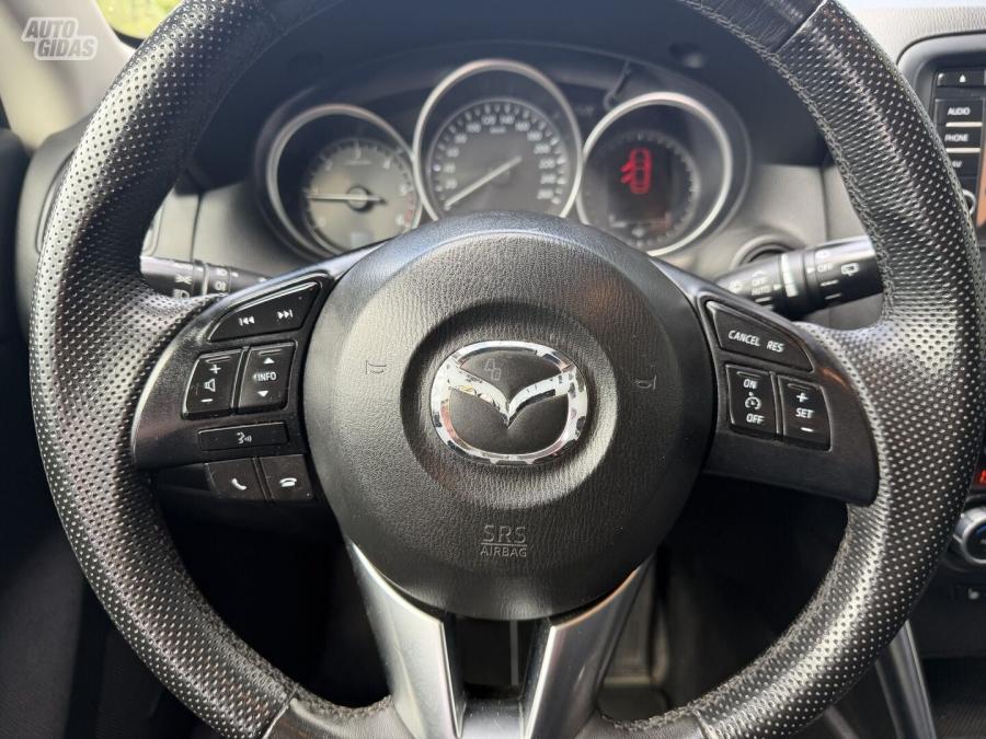 Black Mazda CX-5 2014 in Vilnius, with an engine capacity of 2.20 L and mileage of 310 thousand km for 6666 €, photo 17 on AUTOMOTO.COM.LV