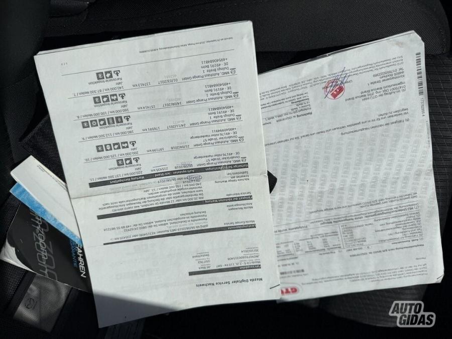 Black Mazda CX-5 2014 in Vilnius, with an engine capacity of 2.20 L and mileage of 310 thousand km for 6666 €, photo 24 on AUTOMOTO.COM.LV