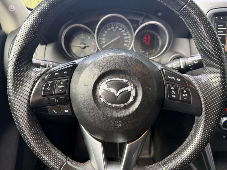 Melns Mazda CX-5 2014 Viļņa, ar dzinēja tilpumu 2.19 L un nobraukumu 300 tūkst. km par 6500 €, foto 18 vietnē AUTOMOTO.COM.LV