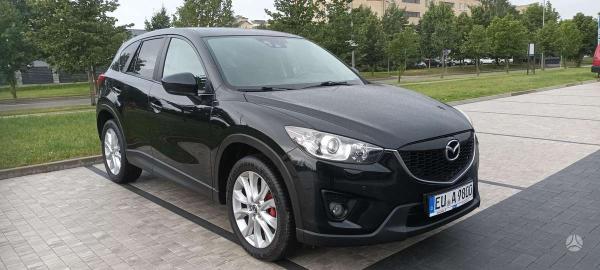 Black Mazda CX-5 2014 in Siauliai, with an engine capacity of 2.19 L and mileage of 186 thousand km for 8850 €, photo 3 on AUTOMOTO.COM.LV