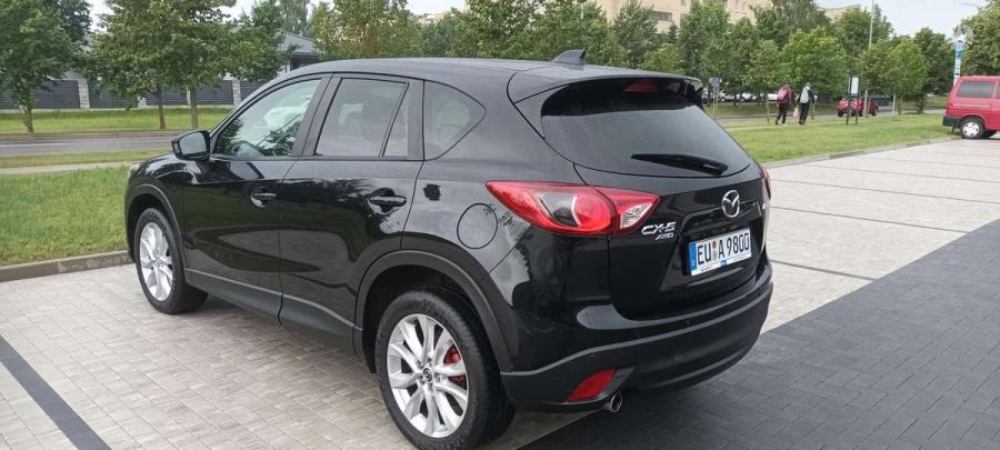 Black Mazda CX-5 2014 in Siauliai, with an engine capacity of 2.19 L and mileage of 186 thousand km for 8850 €, photo 5 on AUTOMOTO.COM.LV
