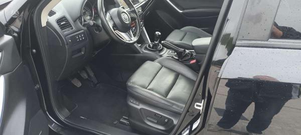Black Mazda CX-5 2014 in Siauliai, with an engine capacity of 2.19 L and mileage of 186 thousand km for 8850 €, photo 6 on AUTOMOTO.COM.LV