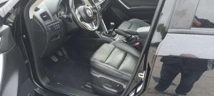 Black Mazda CX-5 2014 in Siauliai, with an engine capacity of 2.19 L and mileage of 186 thousand km for 8850 €, photo 7 on AUTOMOTO.COM.LV