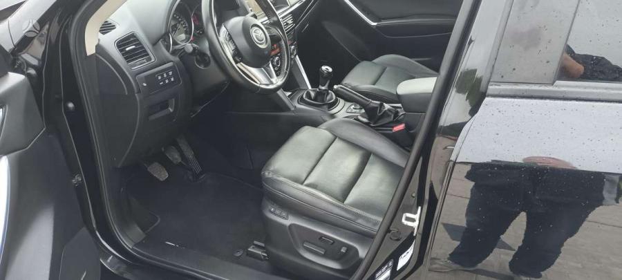 Black Mazda CX-5 2014 in Siauliai, with an engine capacity of 2.19 L and mileage of 186 thousand km for 8850 €, photo 7 on AUTOMOTO.COM.LV