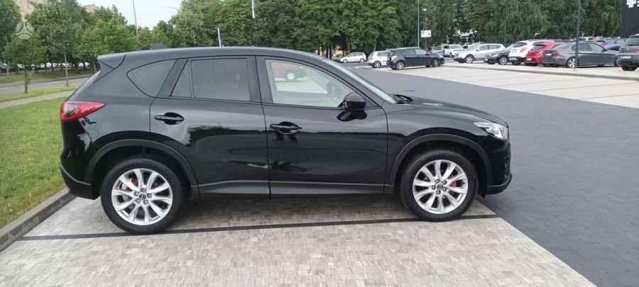 Black Mazda CX-5 2014 in Siauliai, with an engine capacity of 2.19 L and mileage of 186 thousand km for 8850 €, photo 11 on AUTOMOTO.COM.LV