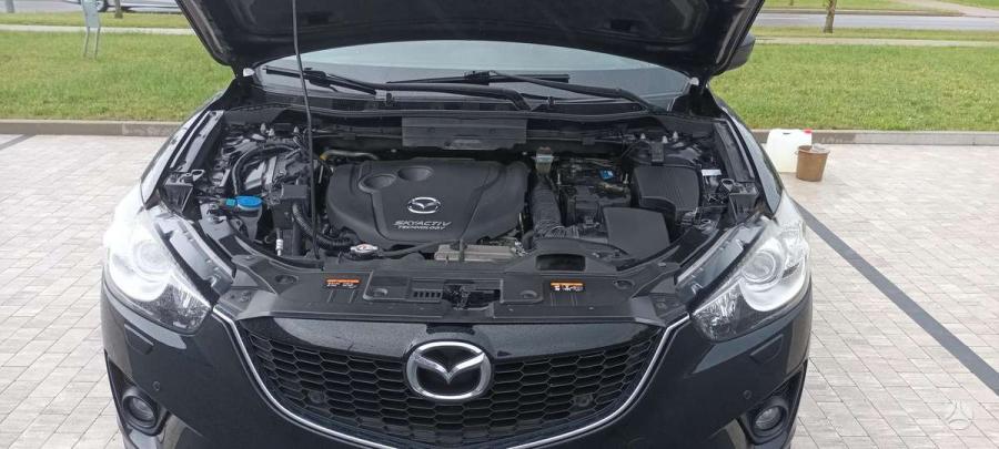 Black Mazda CX-5 2014 in Siauliai, with an engine capacity of 2.19 L and mileage of 186 thousand km for 8850 €, photo 14 on AUTOMOTO.COM.LV