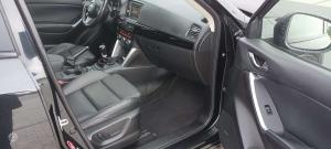 Black Mazda CX-5 2014 in Siauliai, with an engine capacity of 2.19 L and mileage of 186 thousand km for 8850 €, photo 18 on AUTOMOTO.COM.LV