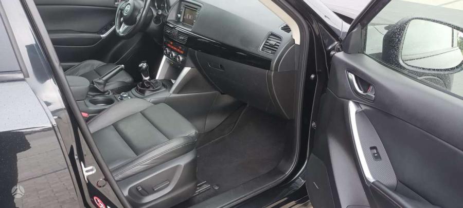 Black Mazda CX-5 2014 in Siauliai, with an engine capacity of 2.19 L and mileage of 186 thousand km for 8850 €, photo 18 on AUTOMOTO.COM.LV