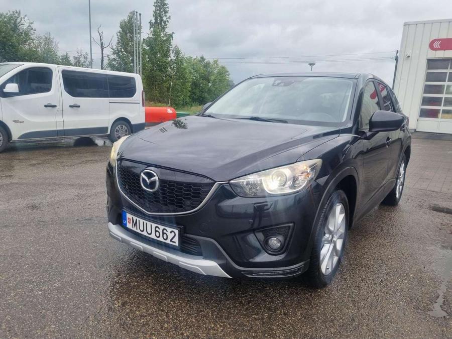 Black Mazda CX-5 2014 in Taurage, with an engine capacity of 2.19 L and mileage of 217 thousand km for 3950 €, photo 1 on AUTOMOTO.COM.LV