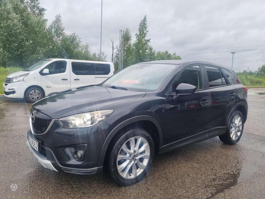 Black Mazda CX-5 2014 in Taurage, with an engine capacity of 2.19 L and mileage of 217 thousand km for 3950 €, photo 3 on AUTOMOTO.COM.LV