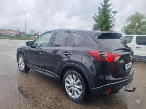 Black Mazda CX-5 2014 in Taurage, with an engine capacity of 2.19 L and mileage of 217 thousand km for 3950 €, photo 4 on AUTOMOTO.COM.LV