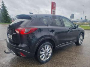 Black Mazda CX-5 2014 in Taurage, with an engine capacity of 2.19 L and mileage of 217 thousand km for 3950 €, photo 8 on AUTOMOTO.COM.LV