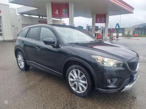Black Mazda CX-5 2014 in Taurage, with an engine capacity of 2.19 L and mileage of 217 thousand km for 3950 €, photo 9 on AUTOMOTO.COM.LV