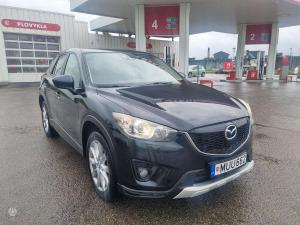 Black Mazda CX-5 2014 in Taurage, with an engine capacity of 2.19 L and mileage of 217 thousand km for 3950 €, photo 10 on AUTOMOTO.COM.LV