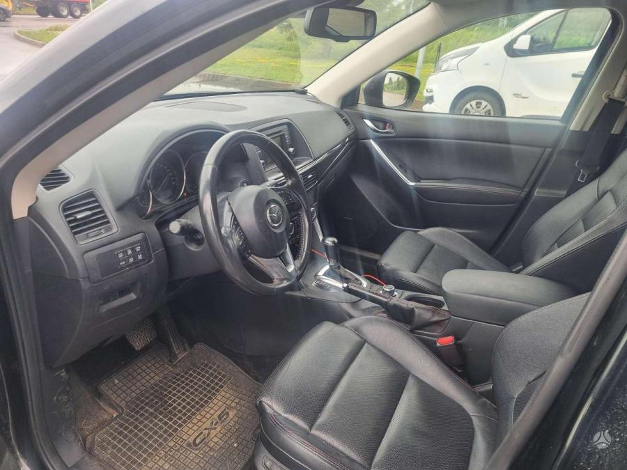 Black Mazda CX-5 2014 in Taurage, with an engine capacity of 2.19 L and mileage of 217 thousand km for 3950 €, photo 11 on AUTOMOTO.COM.LV