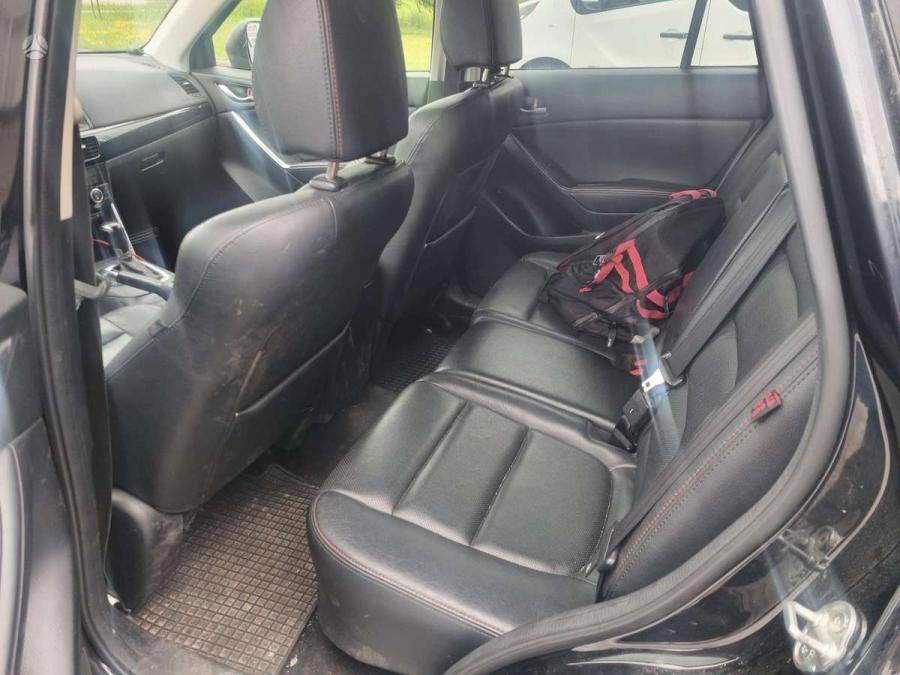 Black Mazda CX-5 2014 in Taurage, with an engine capacity of 2.19 L and mileage of 217 thousand km for 3950 €, photo 12 on AUTOMOTO.COM.LV