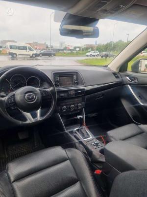 Black Mazda CX-5 2014 in Taurage, with an engine capacity of 2.19 L and mileage of 217 thousand km for 3950 €, photo 13 on AUTOMOTO.COM.LV
