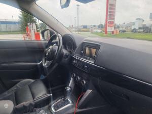 Black Mazda CX-5 2014 in Taurage, with an engine capacity of 2.19 L and mileage of 217 thousand km for 3950 €, photo 14 on AUTOMOTO.COM.LV