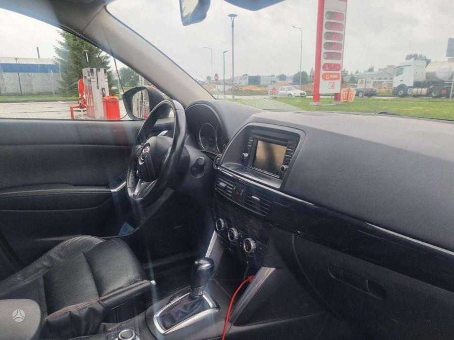 Black Mazda CX-5 2014 in Taurage, with an engine capacity of 2.19 L and mileage of 217 thousand km for 3950 €, photo 14 on AUTOMOTO.COM.LV