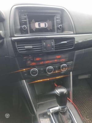 Black Mazda CX-5 2014 in Taurage, with an engine capacity of 2.19 L and mileage of 217 thousand km for 3950 €, photo 21 on AUTOMOTO.COM.LV